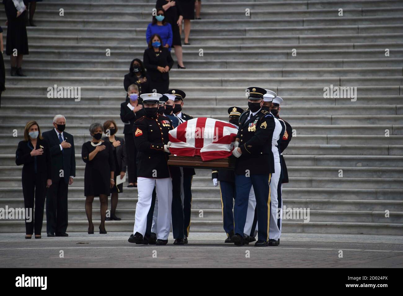 The flag-draped casket of Supreme Court Justice Ruth Bader Ginsburg is ...