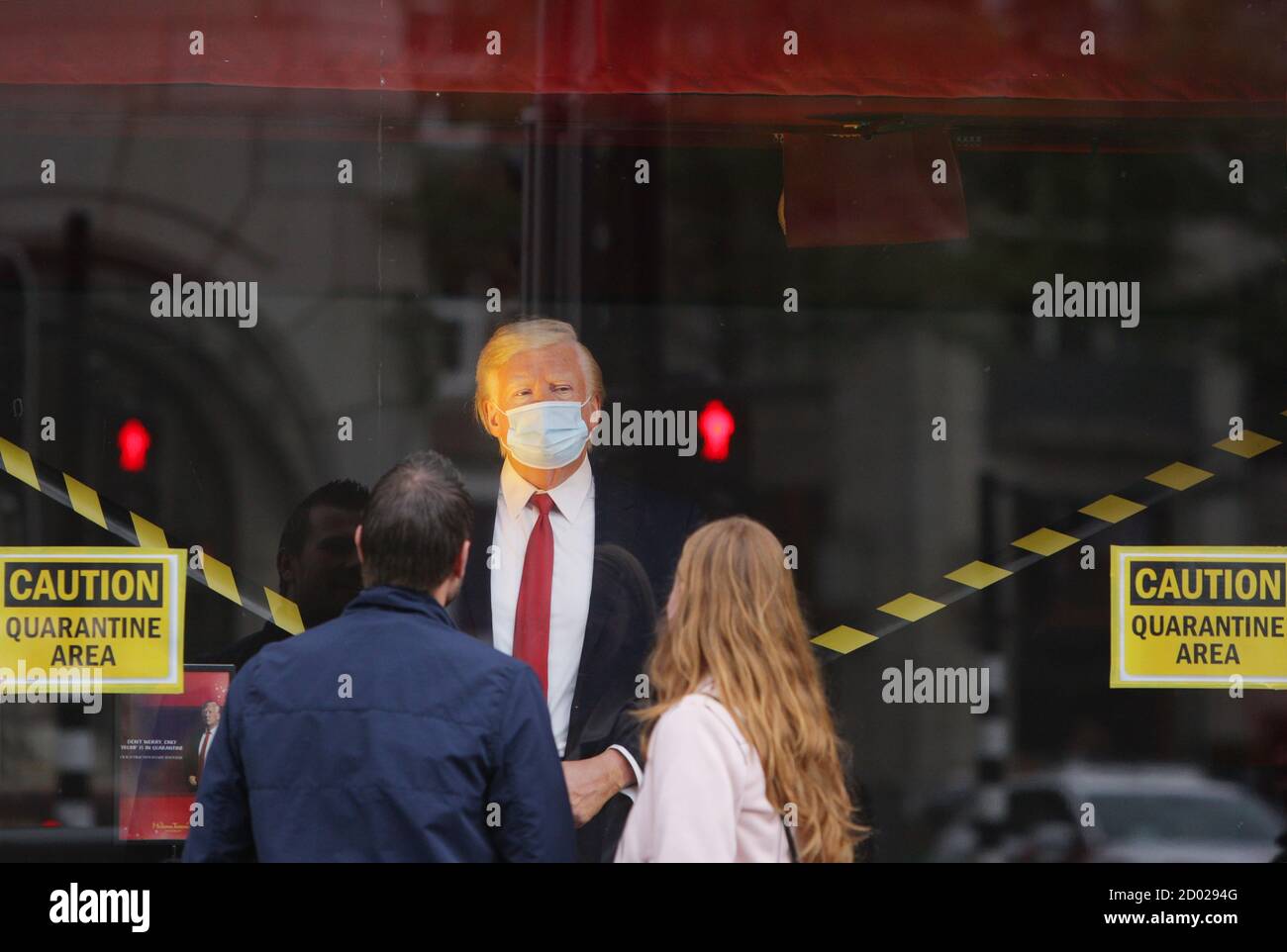Amsterdam, Netherlands. 02nd Oct, 2020. A couple watch the wax figure ...