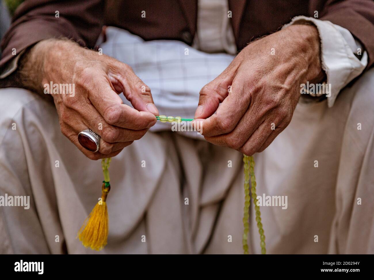 Counting prayer beads hi-res stock photography and images - Alamy