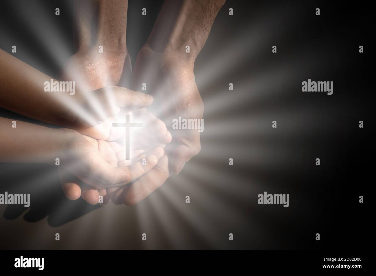 Praying and teaching, child and adult praying together Stock Photo - Alamy
