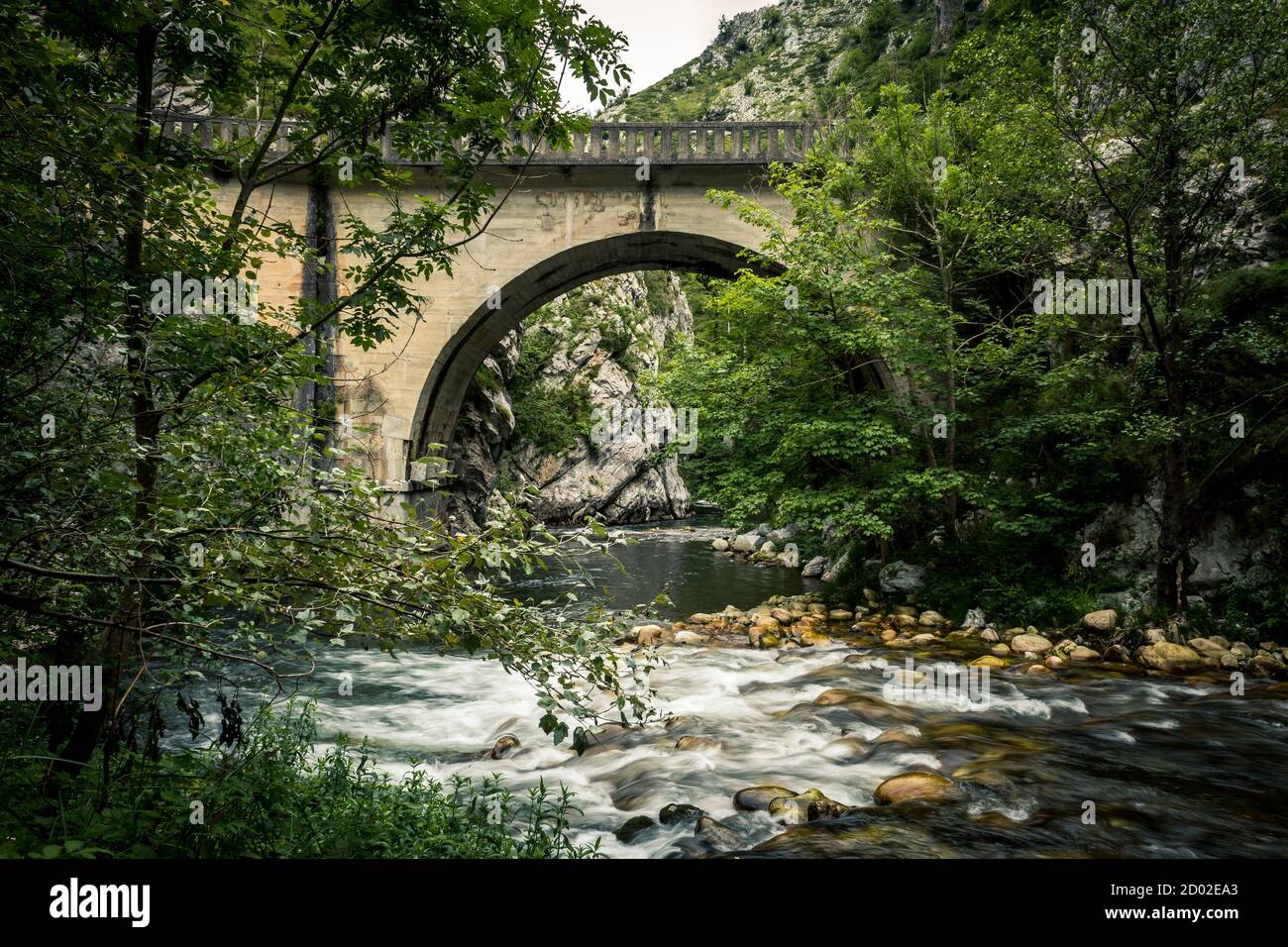 Bridge over the Nalon River Stock Photo - Alamy