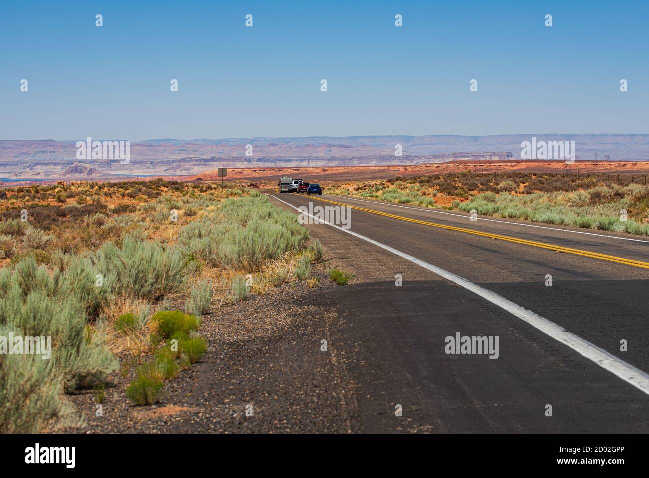 Empty asphalt highway and blue sky. Long Desert Highway California ...