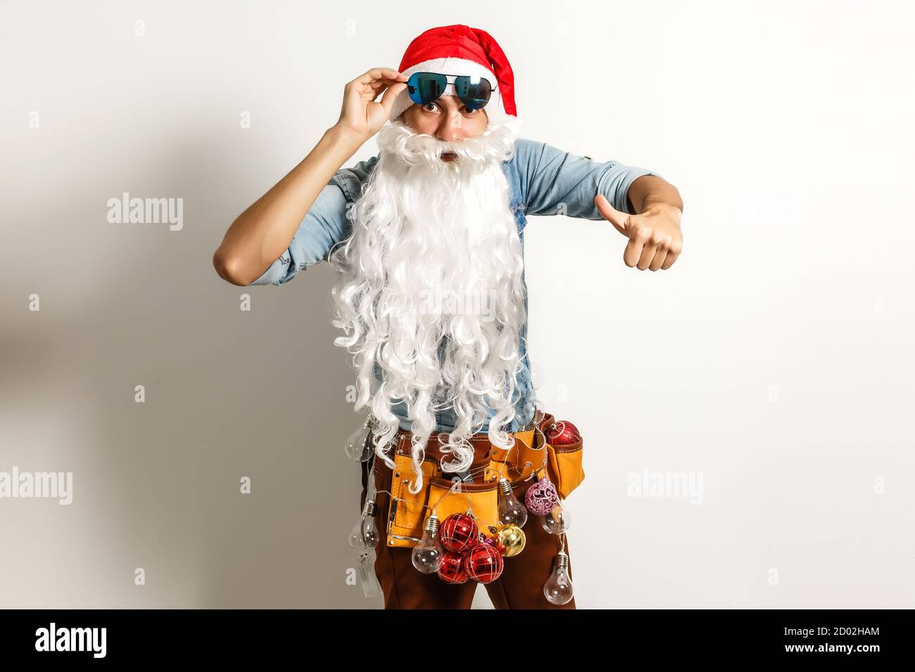 Santa with construction tools, santa repairman Stock Photo - Alamy