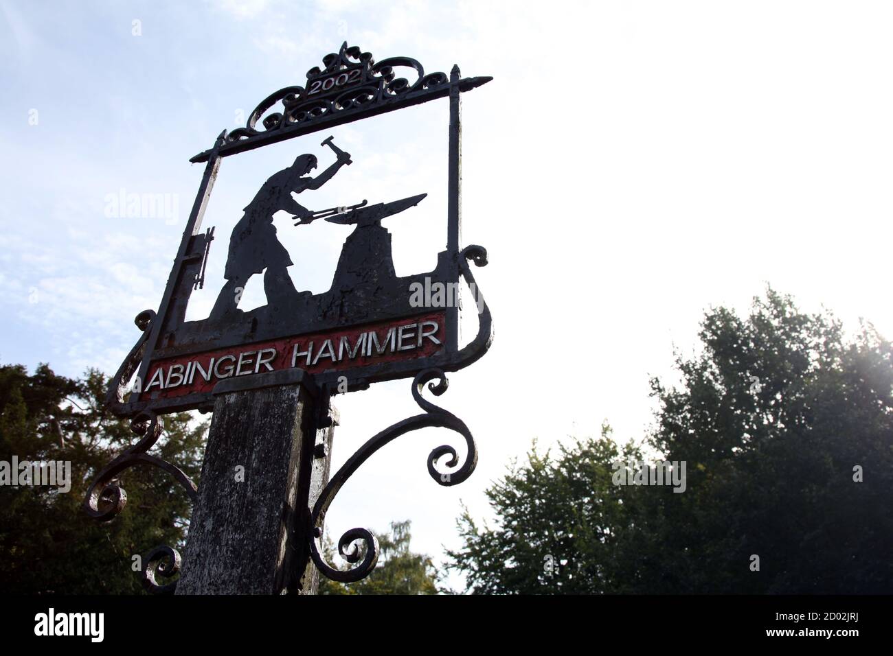 Abinger Hammer village sign post in the quaint village located in the ...