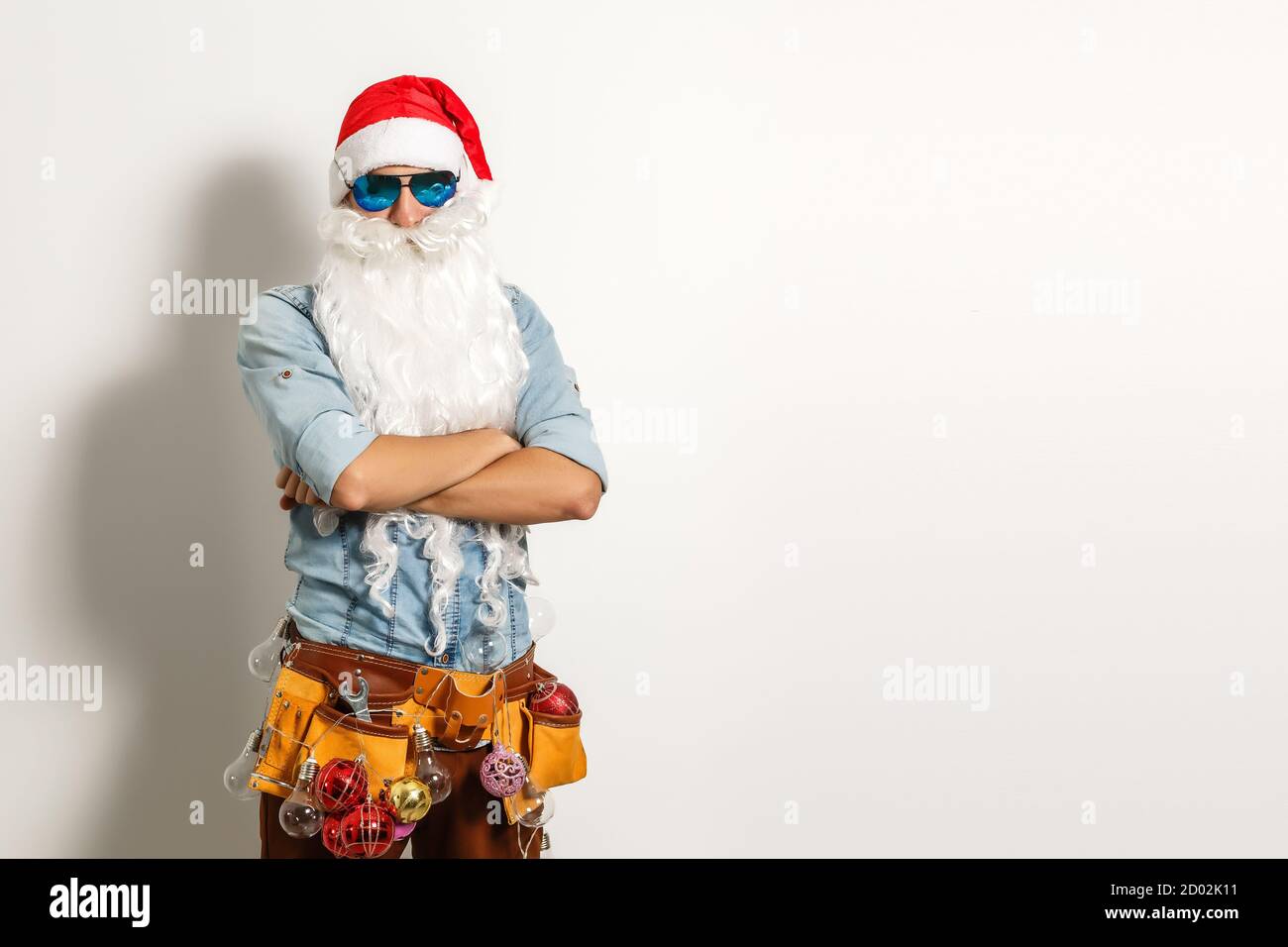 Santa with construction tools, santa repairman Stock Photo - Alamy