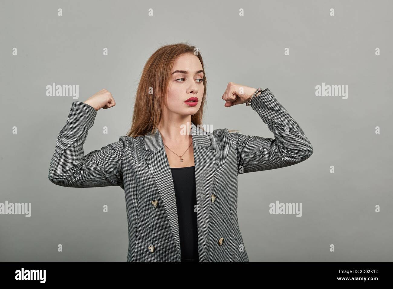 Feels proud have strength, shows great power, raises arms to show ...