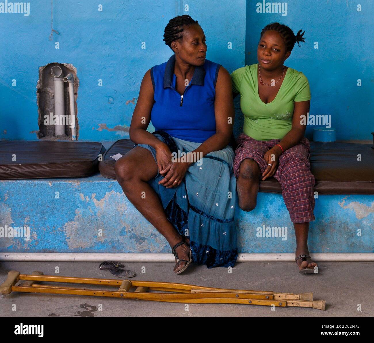 Amputee woman crutches hi-res stock photography and images - Alamy