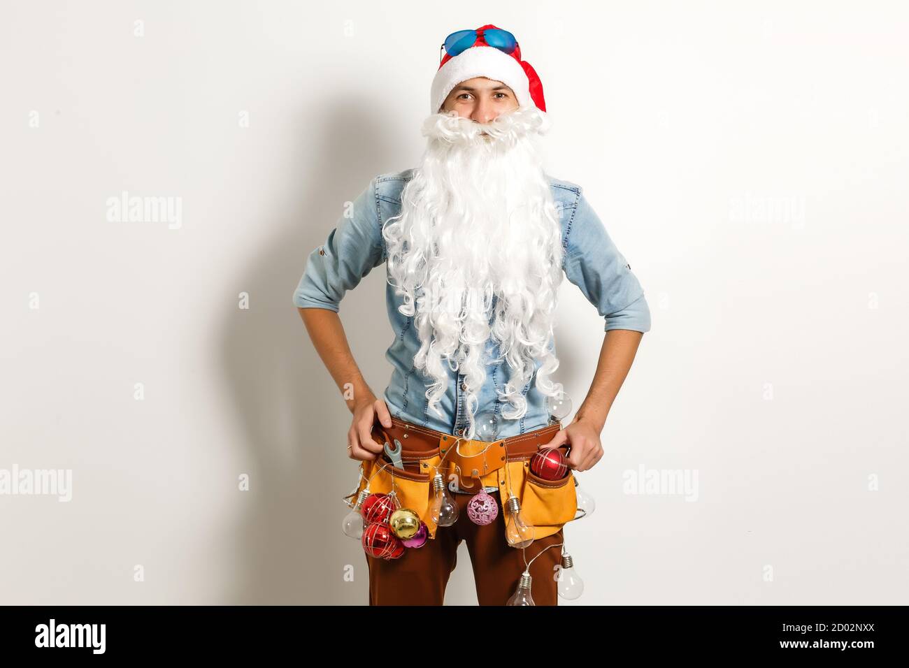 Santa with construction tools, santa repairman Stock Photo - Alamy