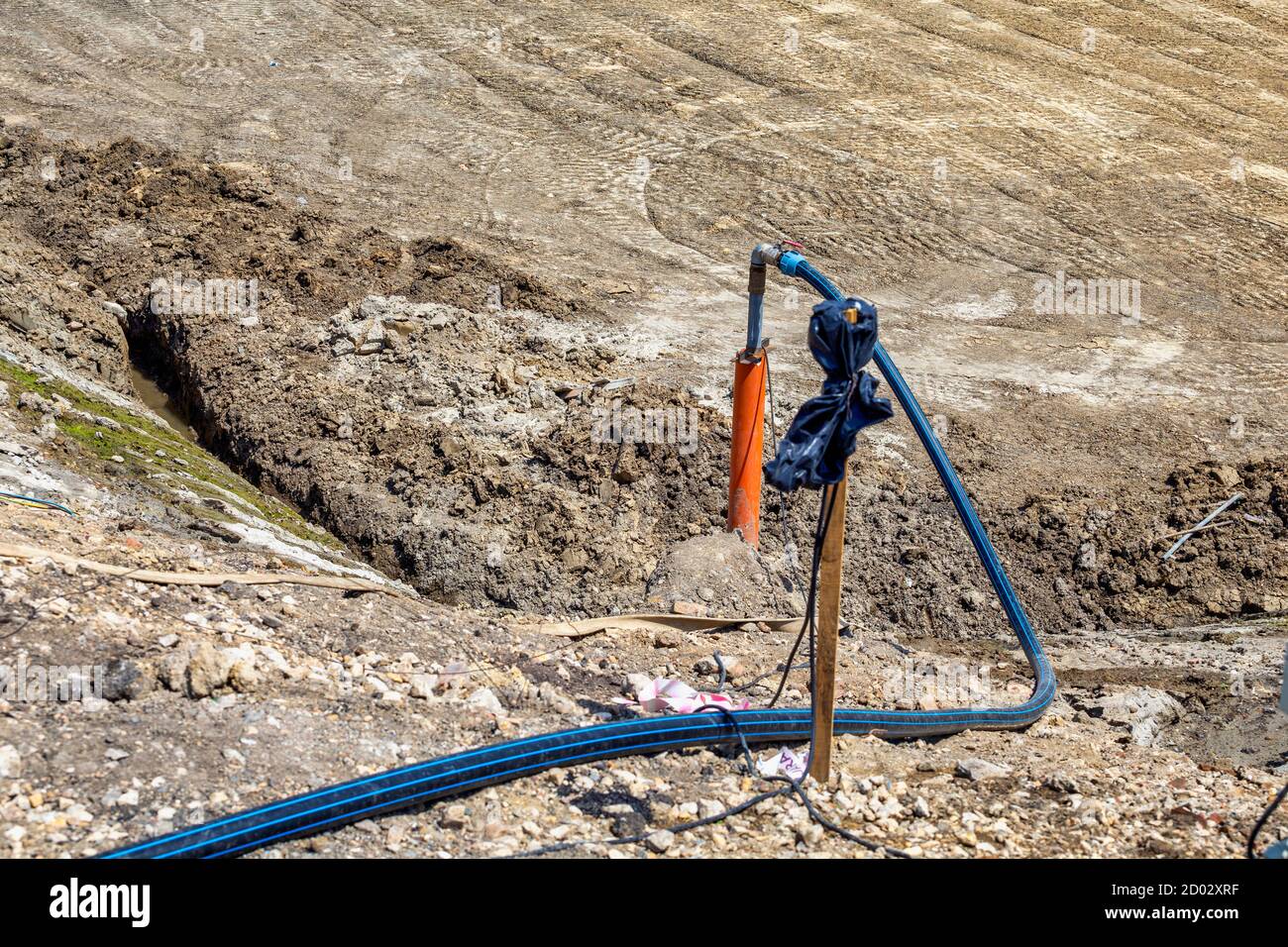 Dewatering construction site. Pumping water out of the construction ...