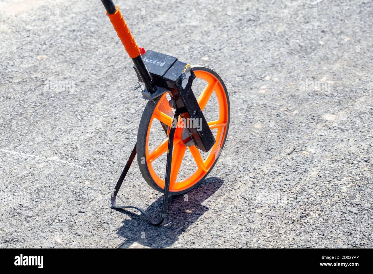 Distance measuring wheel device at the construction site Stock Photo Alamy