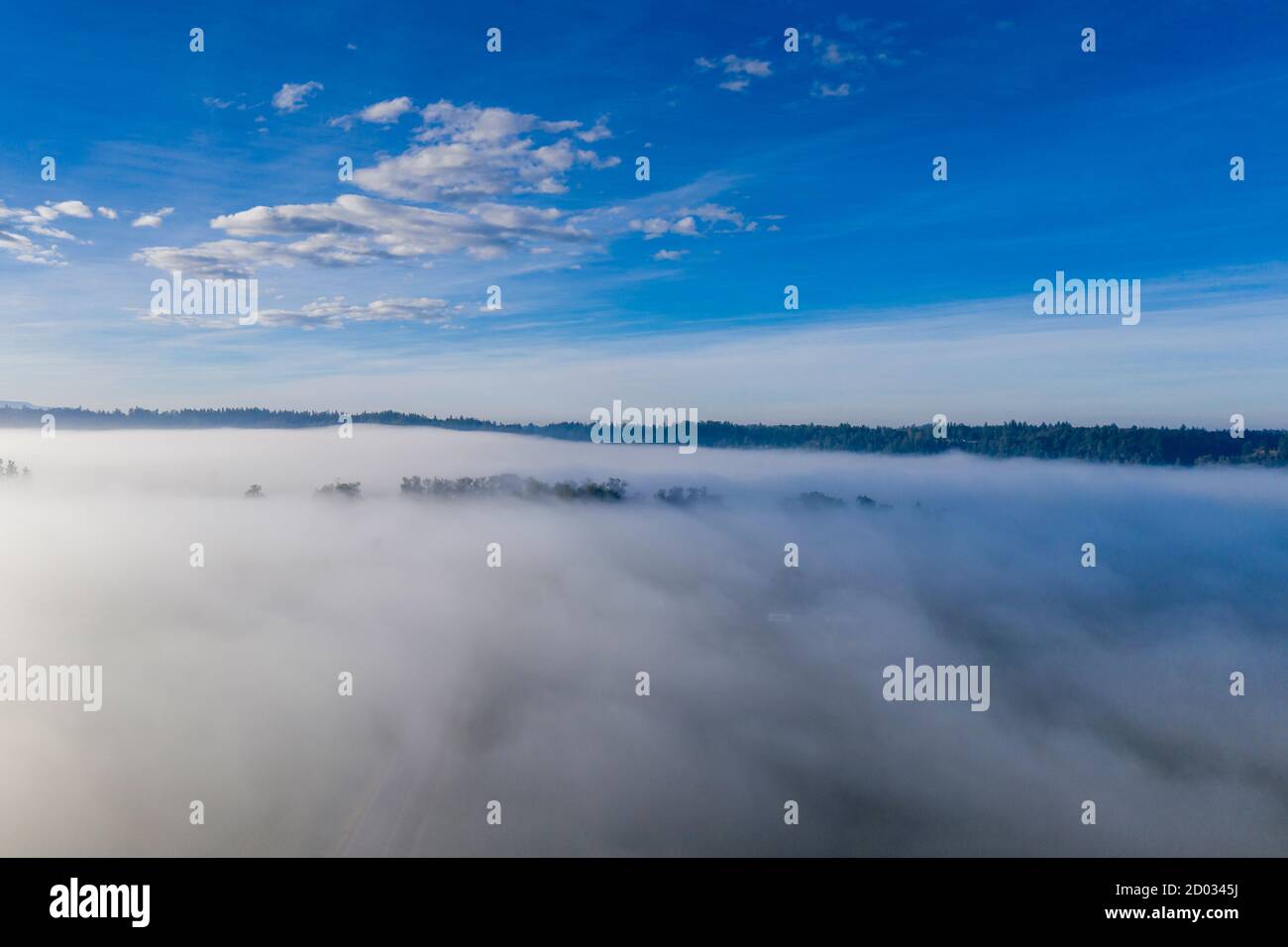 Sunlight through clouds fog hi-res stock photography and images - Alamy