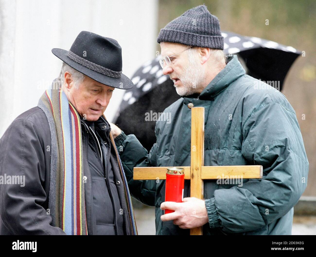 Relatives and friends of victims attend a memorial ceremony for the ...