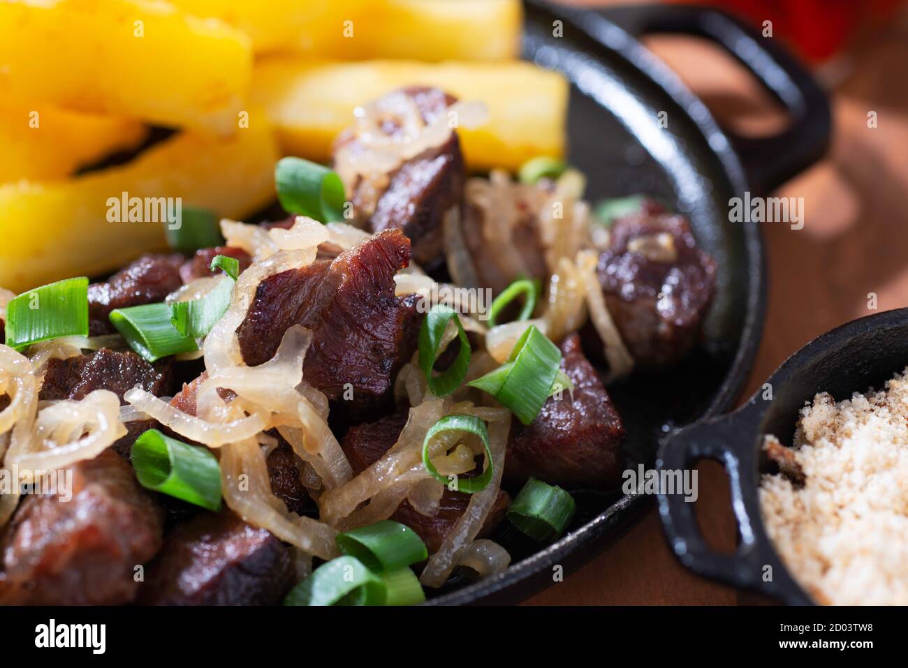 typical local food, fried meat with onions and cassava, Brazil Stock ...
