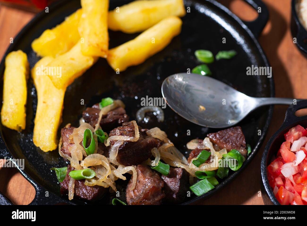 typical local food, fried meat with onions and cassava, Brazil Stock ...