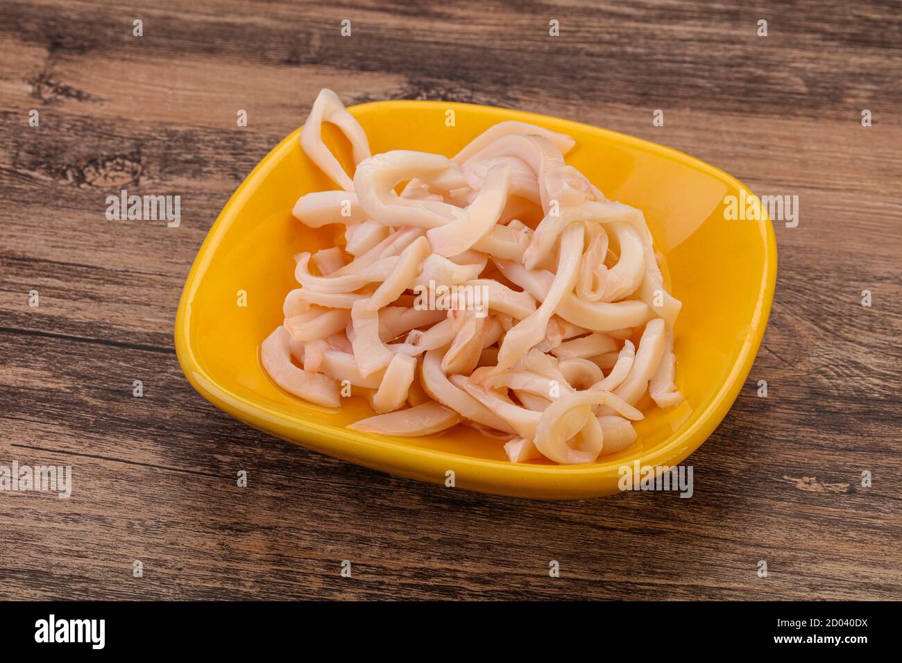 Tasty Marinated squid slices snack in the bowl Stock Photo - Alamy