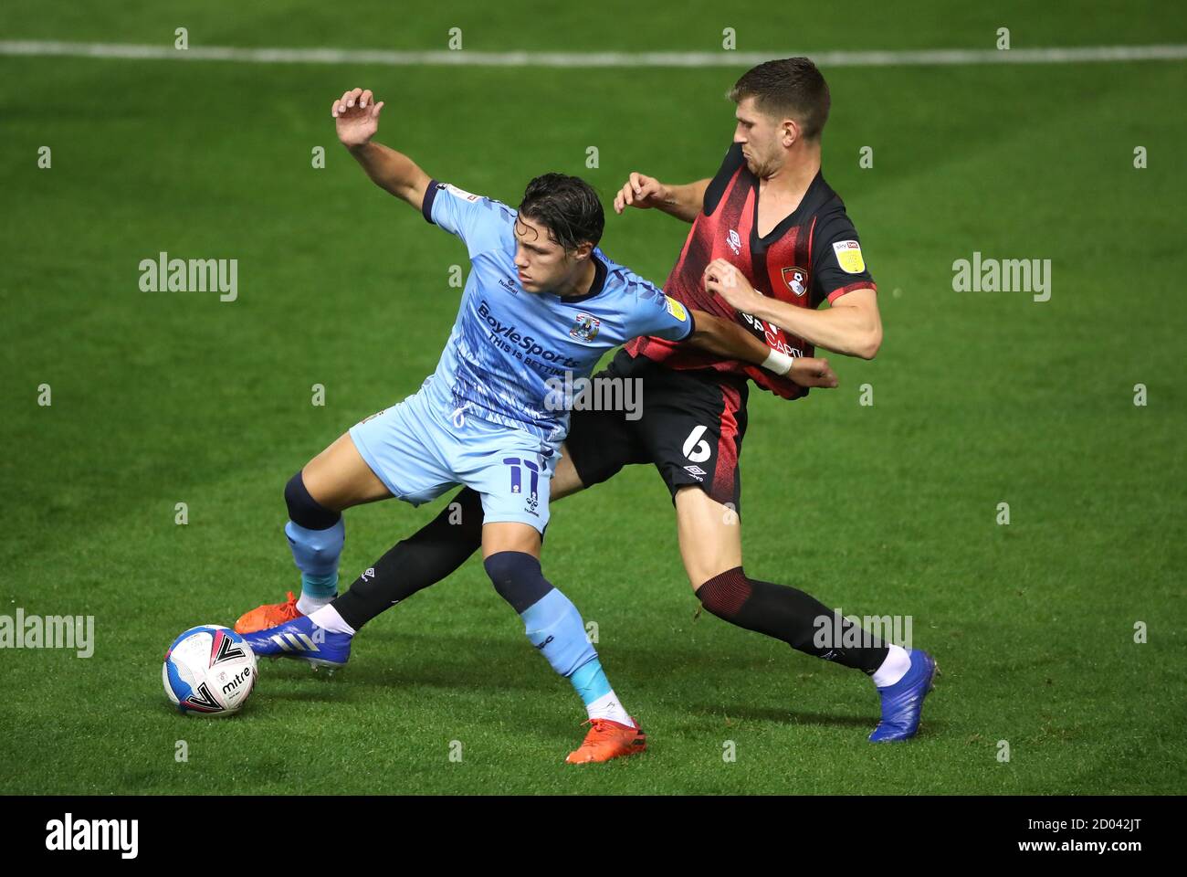 Coventry City's Callum O'Hare (left) and AFC Bournemouth's Chris Mepham ...