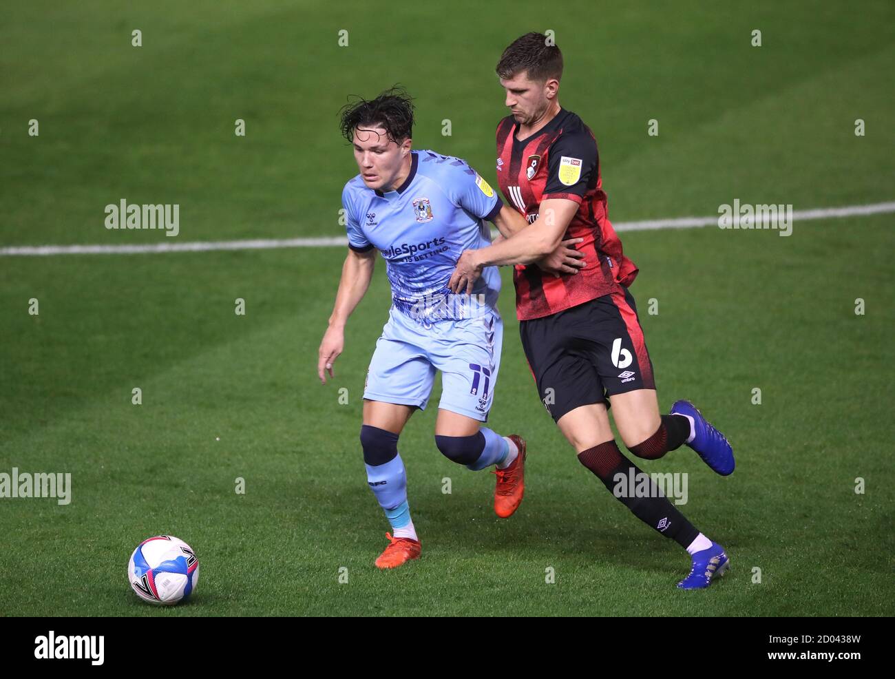 Coventry City's Callum O'Hare (left) and AFC Bournemouth's Chris Mepham ...