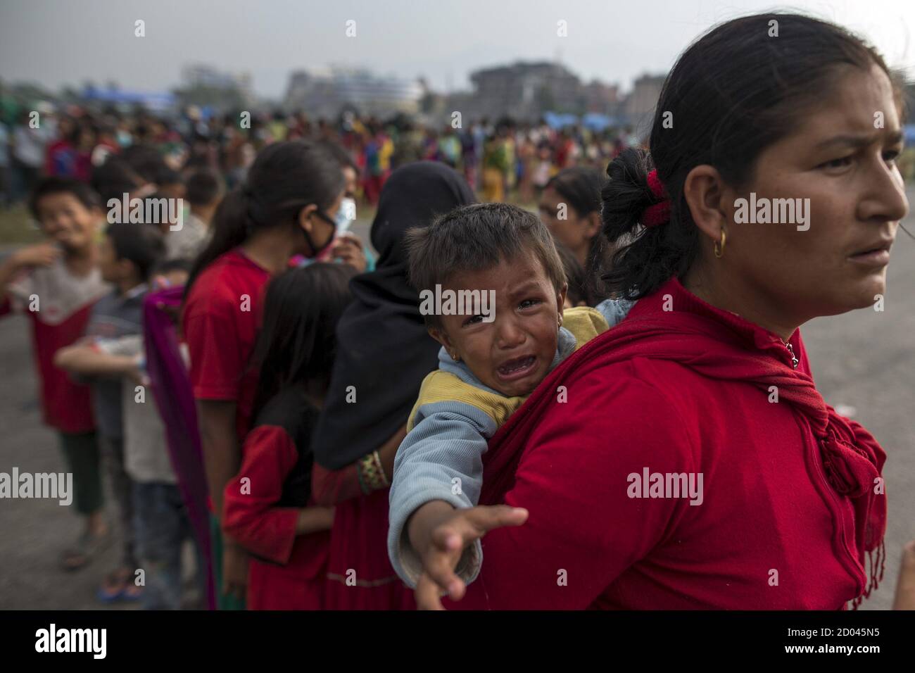 People crying during earthquake hi-res stock photography and images - Alamy