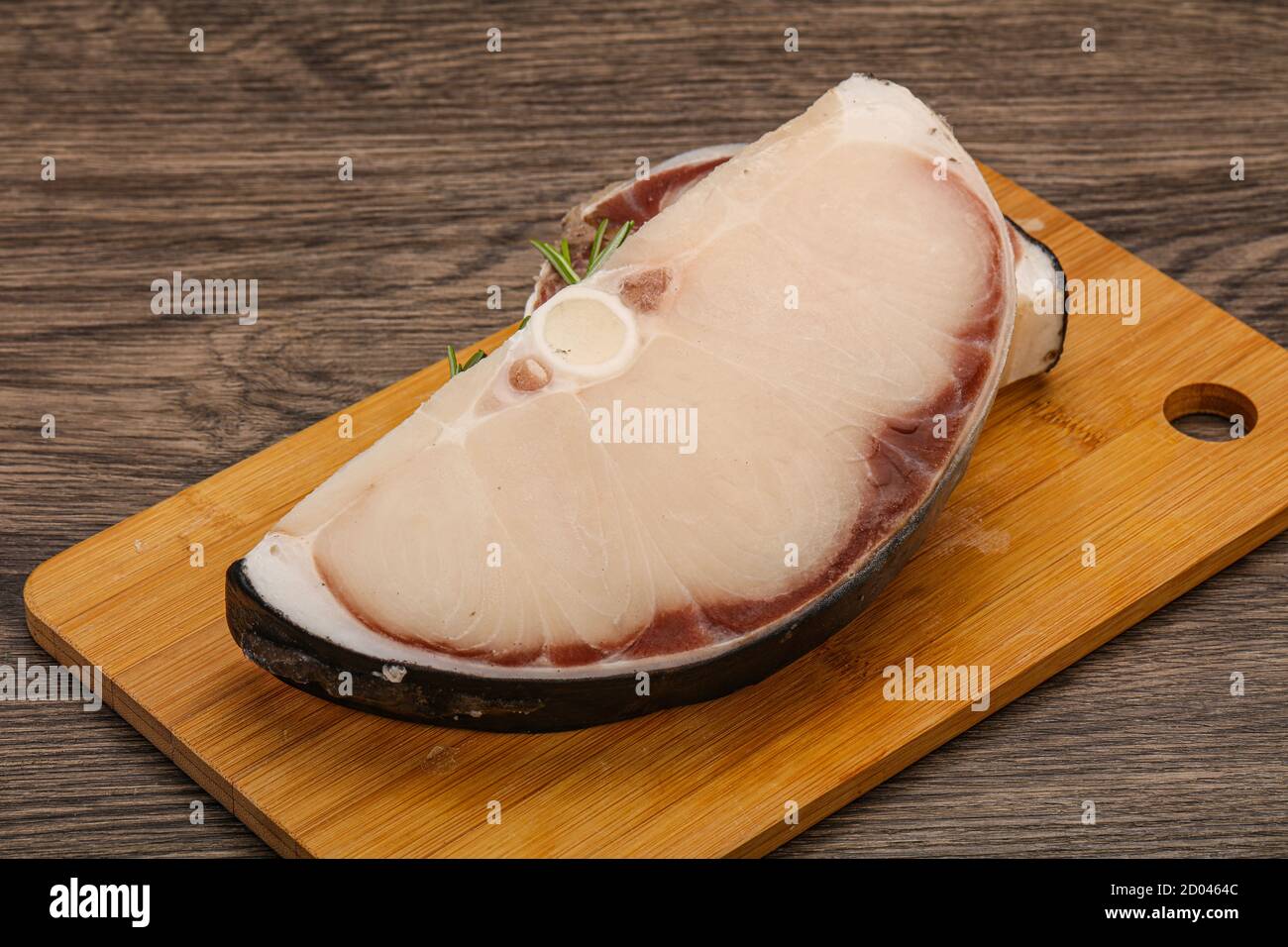 Raw shark steak served rosemary for cooking Stock Photo - Alamy