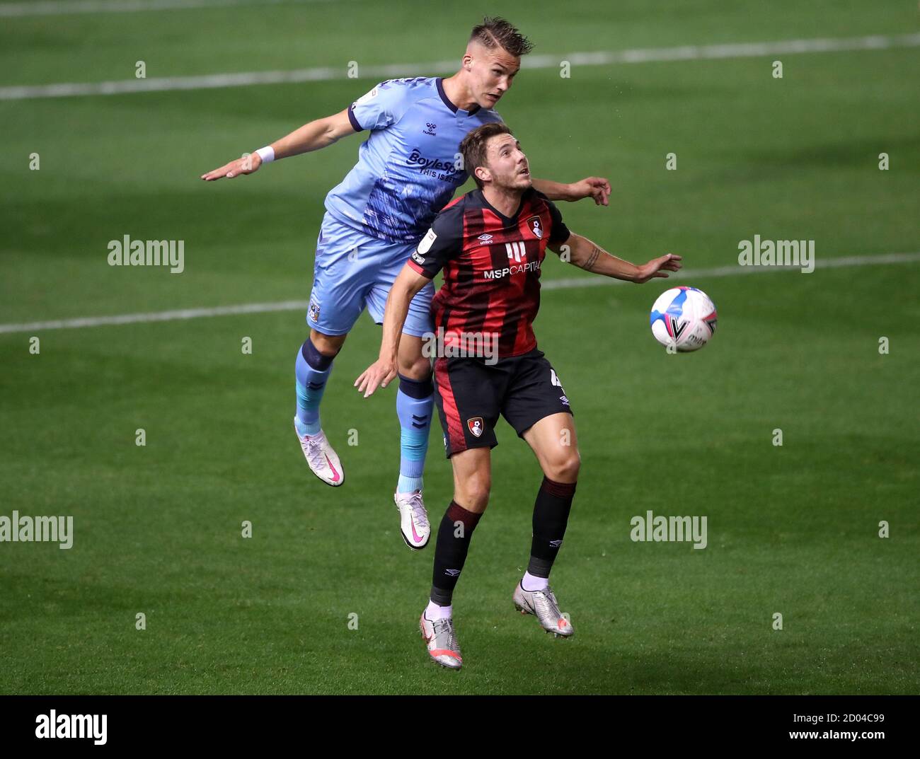 Coventry City's Leo Ostigard (left) and AFC Bournemouth's Dan Gosling ...
