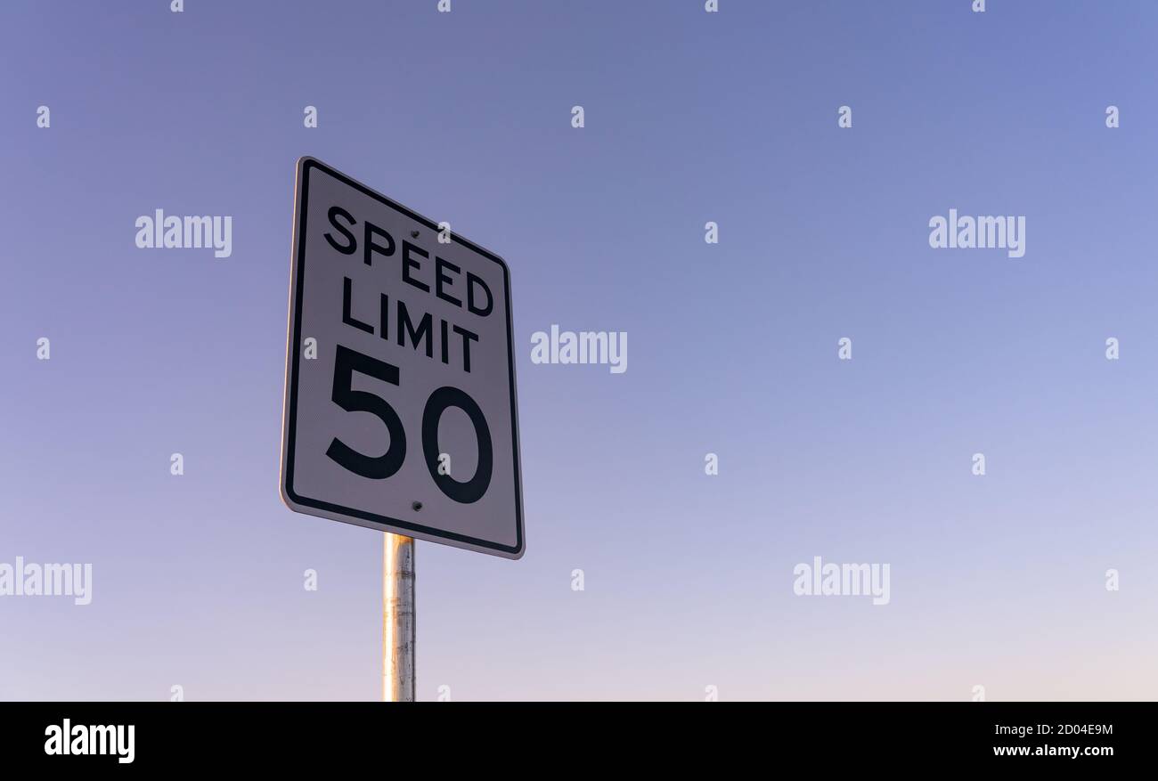View of Speed Limit Sign on the Side of Road During Early Morning Stock ...