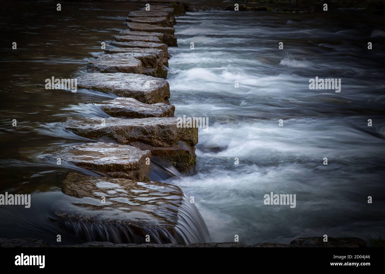 Stepping stones with cascading water in the Peak District Stock Photo ...