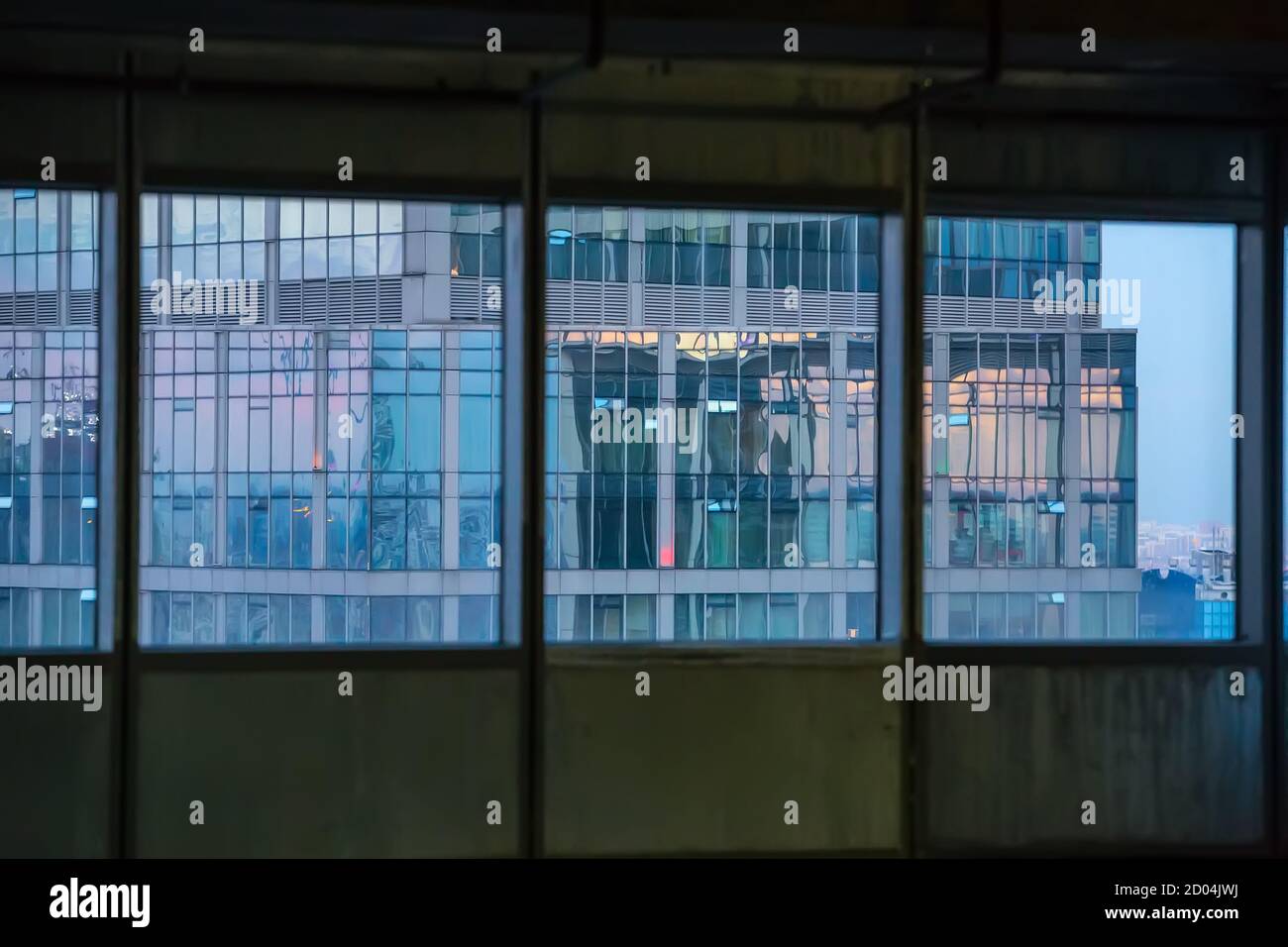 modern skyscraper with glass facade from the window of the building ...