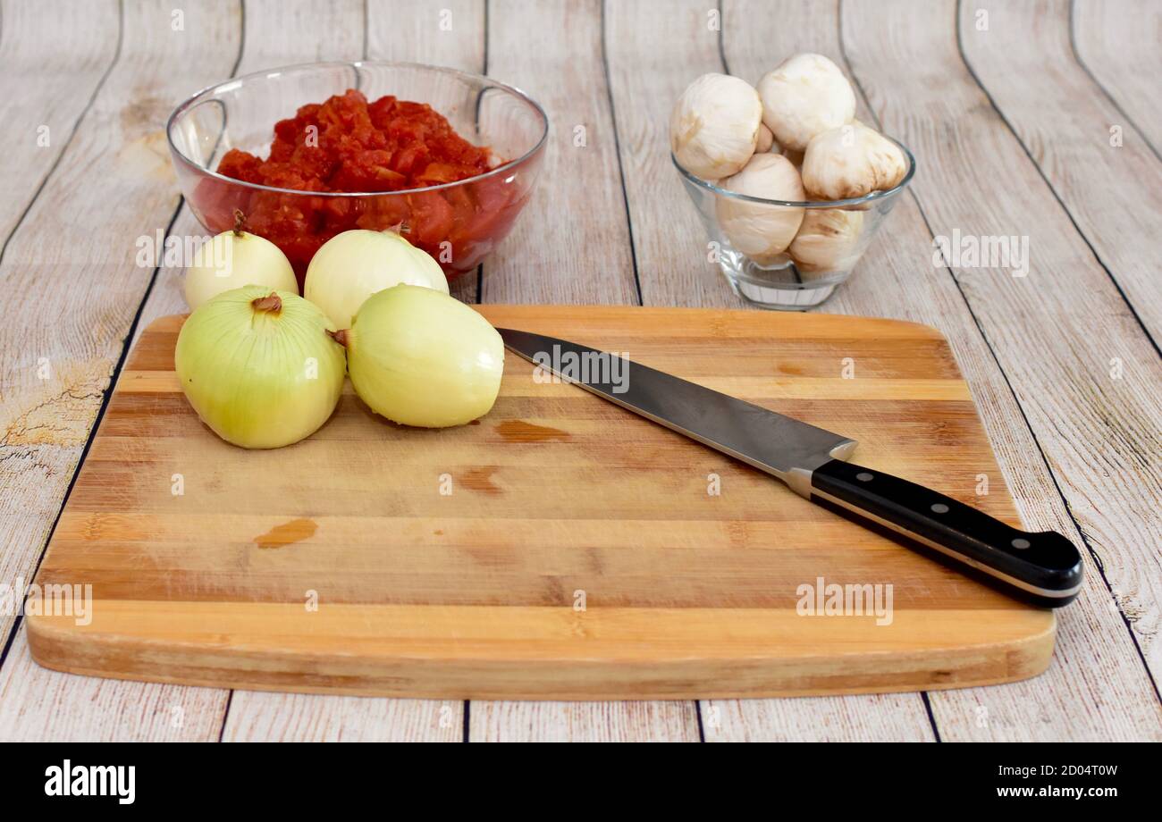 Chef add chopped tomatoes in hi-res stock photography and images - Alamy