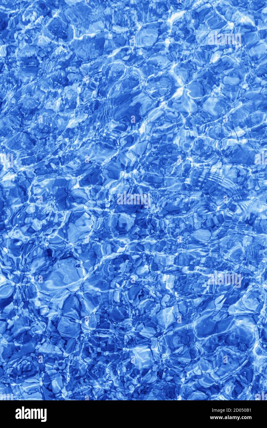 Shallow water, natural blue background. Color tinting Stock Photo - Alamy