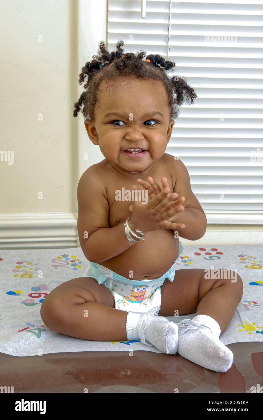 Baby girl goes to the doctor for a checkup. Photo by Liz Roll Stock ...