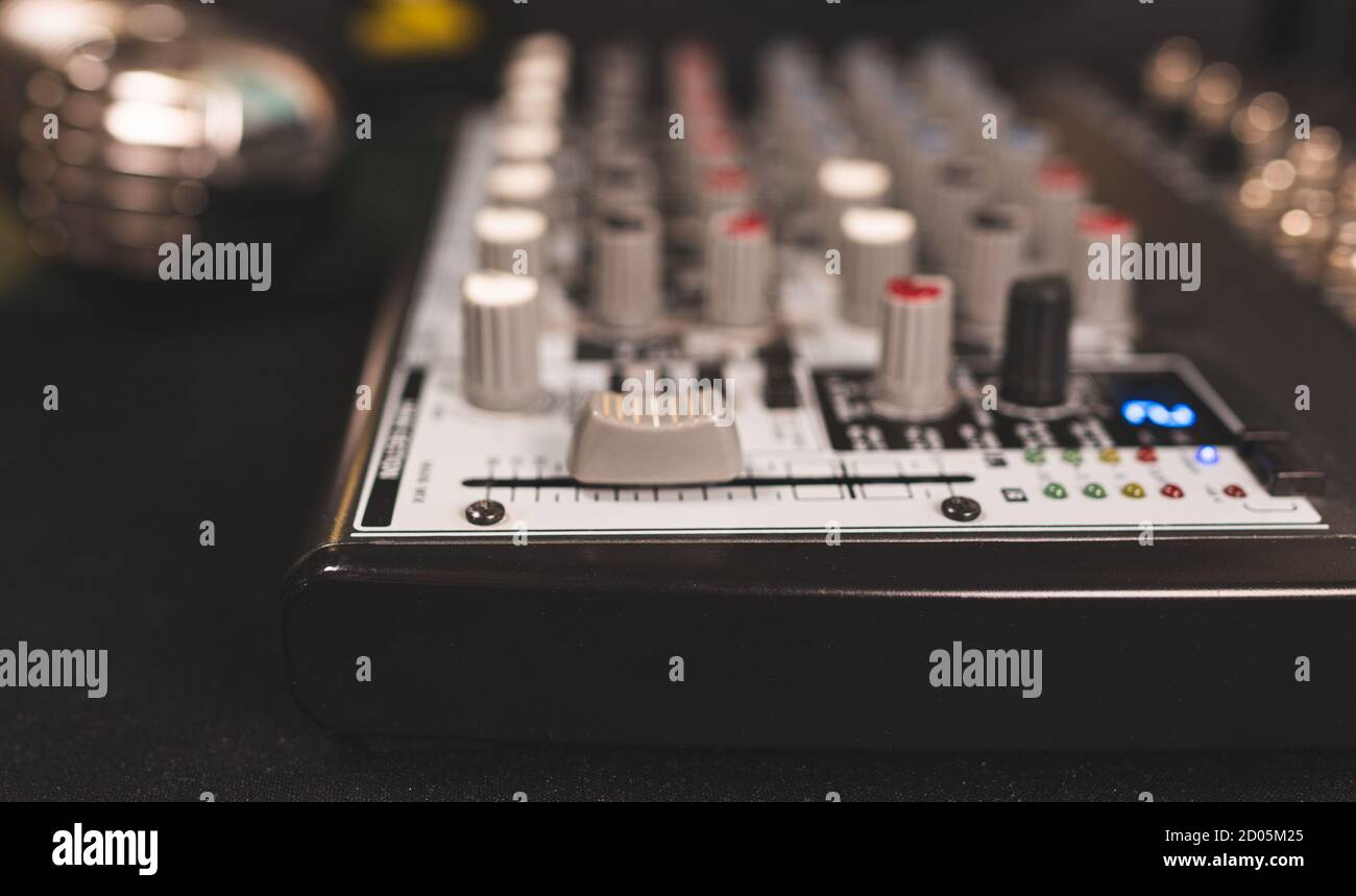 Close-up of main control fader of music studio mixer Stock Photo - Alamy
