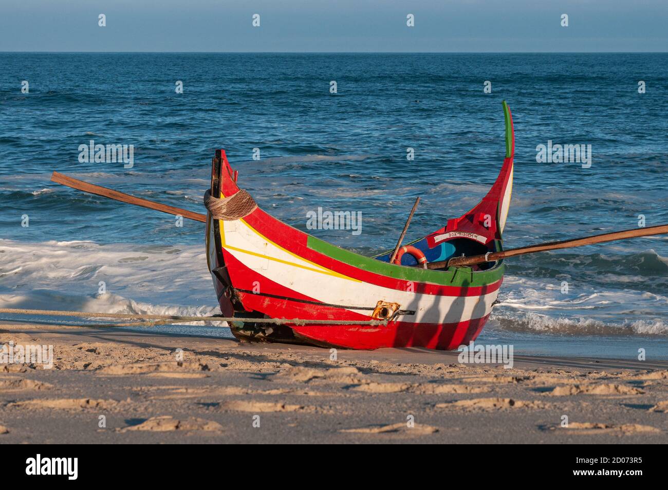 Traditional xávega fishing-boat parked at the beach, Portugal Stock ...