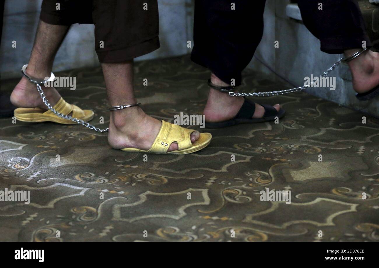 Chained feet hi-res stock photography and images - Alamy