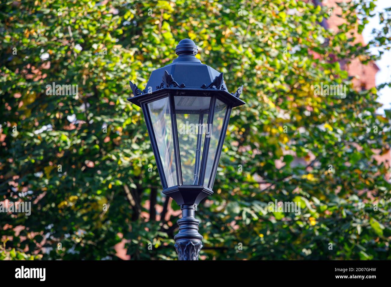 beautiful street lamp on a background of autumn leaves Stock Photo - Alamy