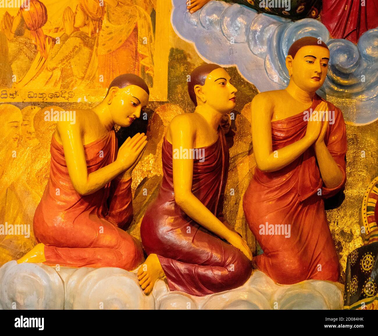 Statue of Three Monks Praying in Supplication in Gangaramaya Temple in ...