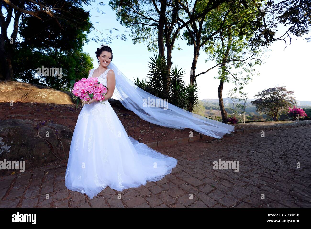 beautiful brazilian bride dressed in wedding attire Stock Photo - Alamy