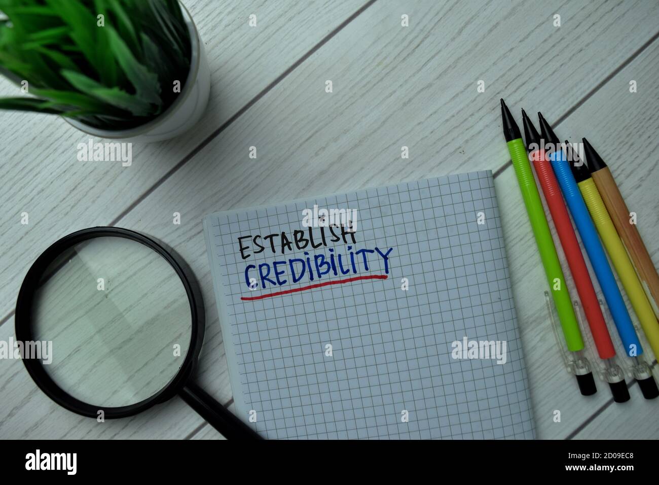 Establish Credibility write on a book isolated on office desk Stock ...
