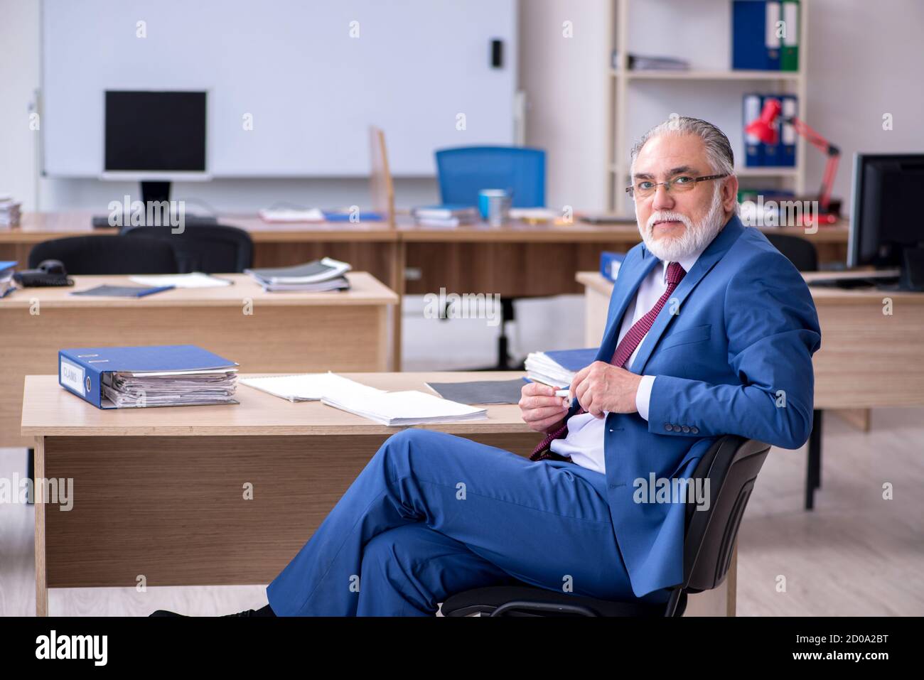 Male boss employee working in the office Stock Photo - Alamy