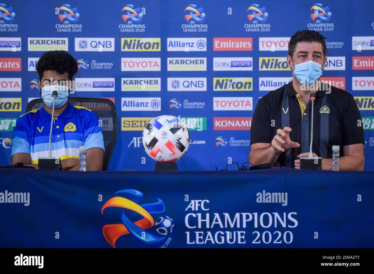 Doha, Qatar. 2nd Oct, 2020. Al Nassr's head coach Rui Vitoria (R) and ...