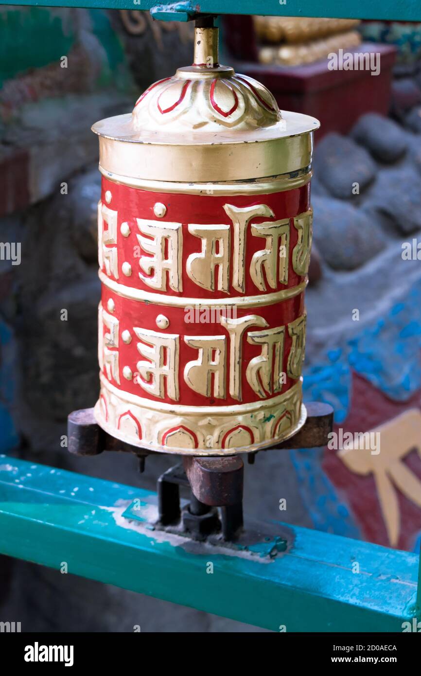 Prayer wheels is spinned by devotees to aid for meditation and ...