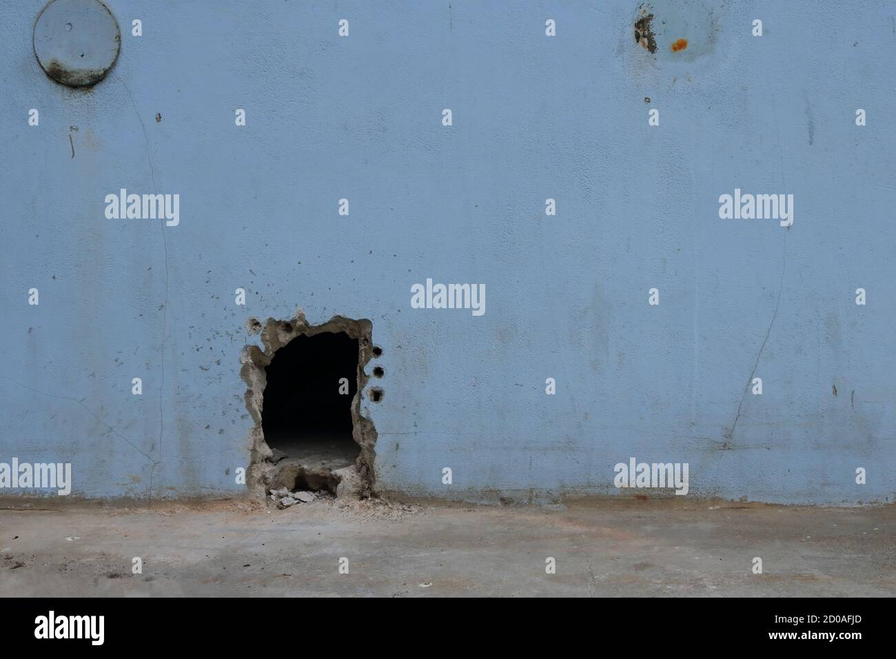 Hole breaking wall hi-res stock photography and images - Alamy