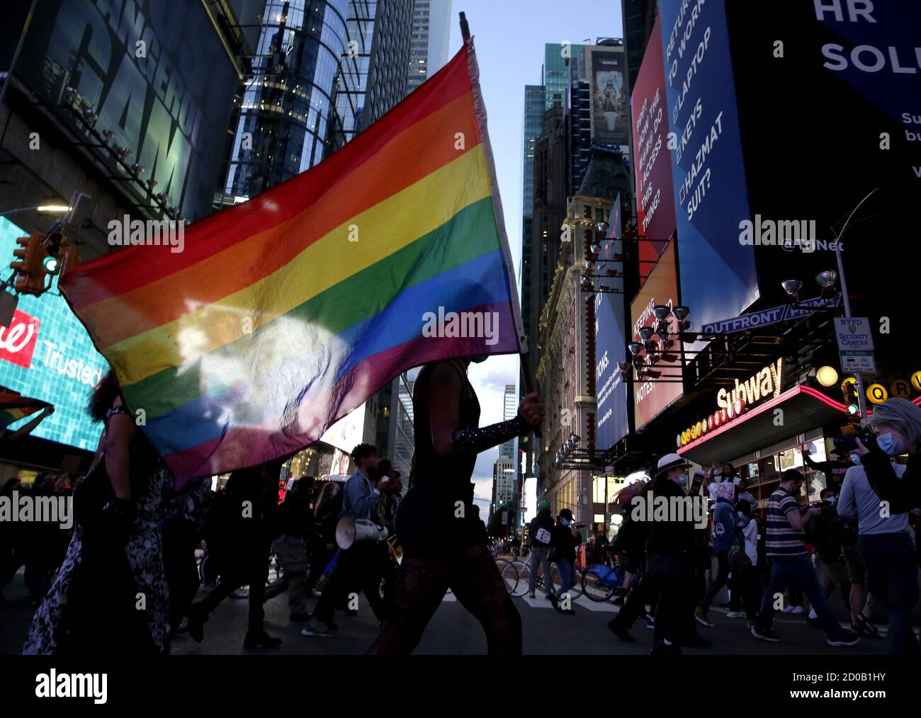 New York, United States. 02nd Oct, 2020. Protesters hold rainbow flags ...
