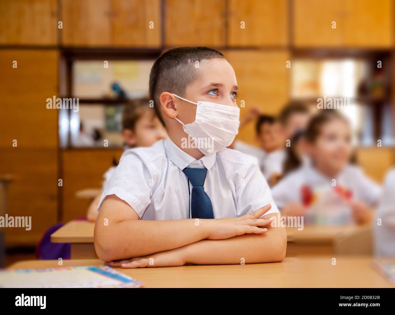 Children sitting exam school uniform hi-res stock photography and ...