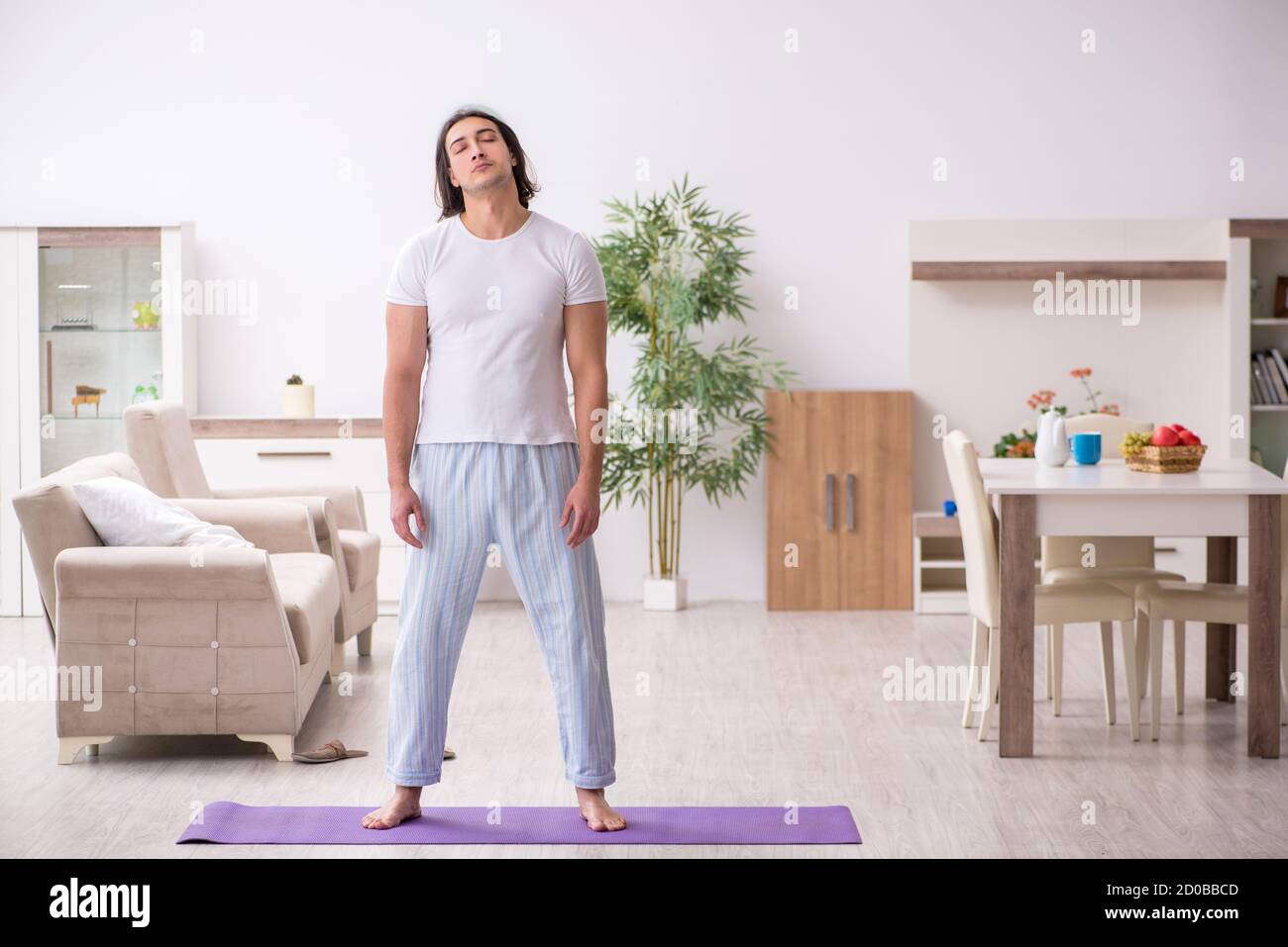 Man starting day with morning exercises Stock Photo - Alamy