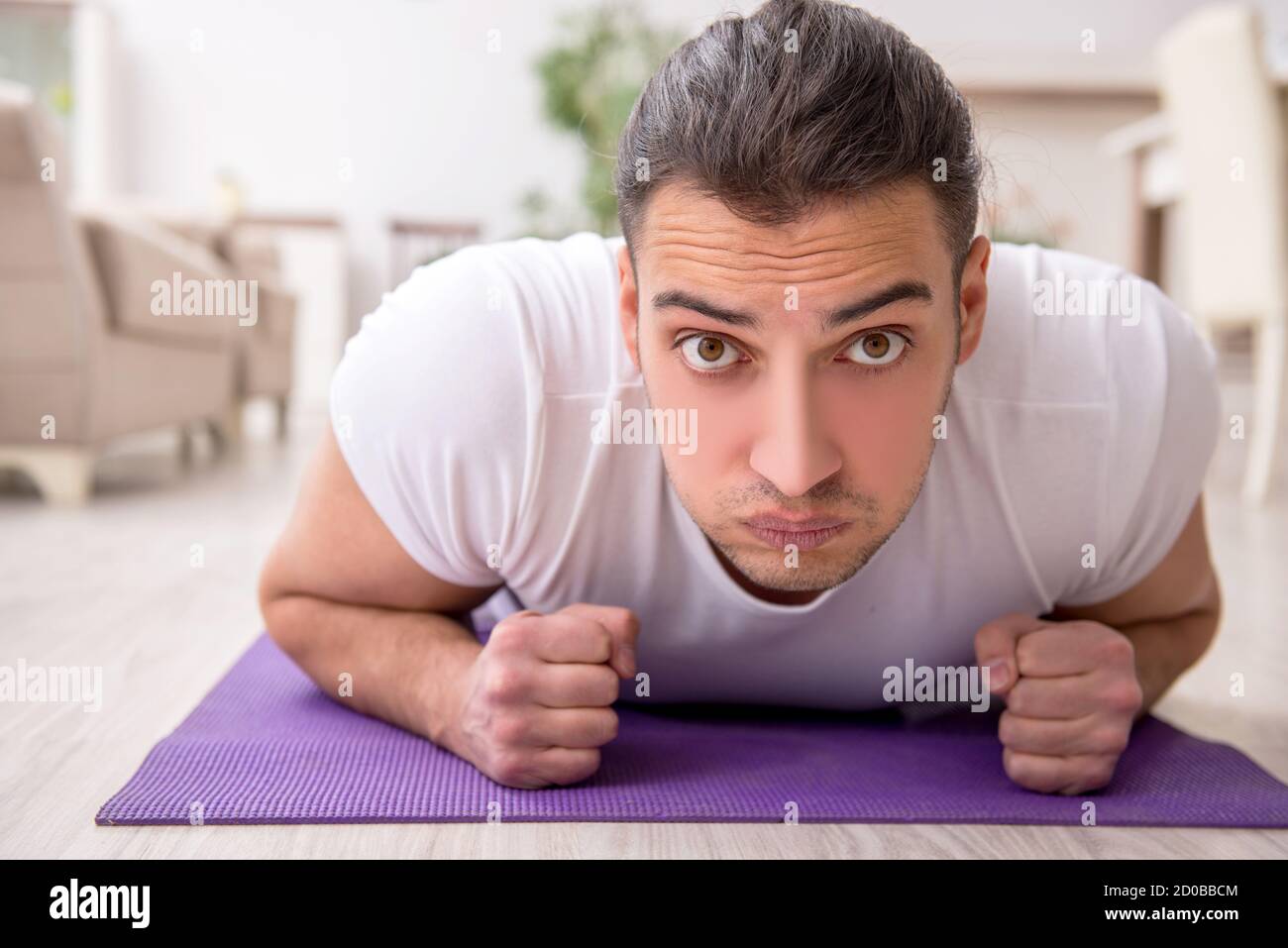 Man starting day with morning exercises Stock Photo - Alamy
