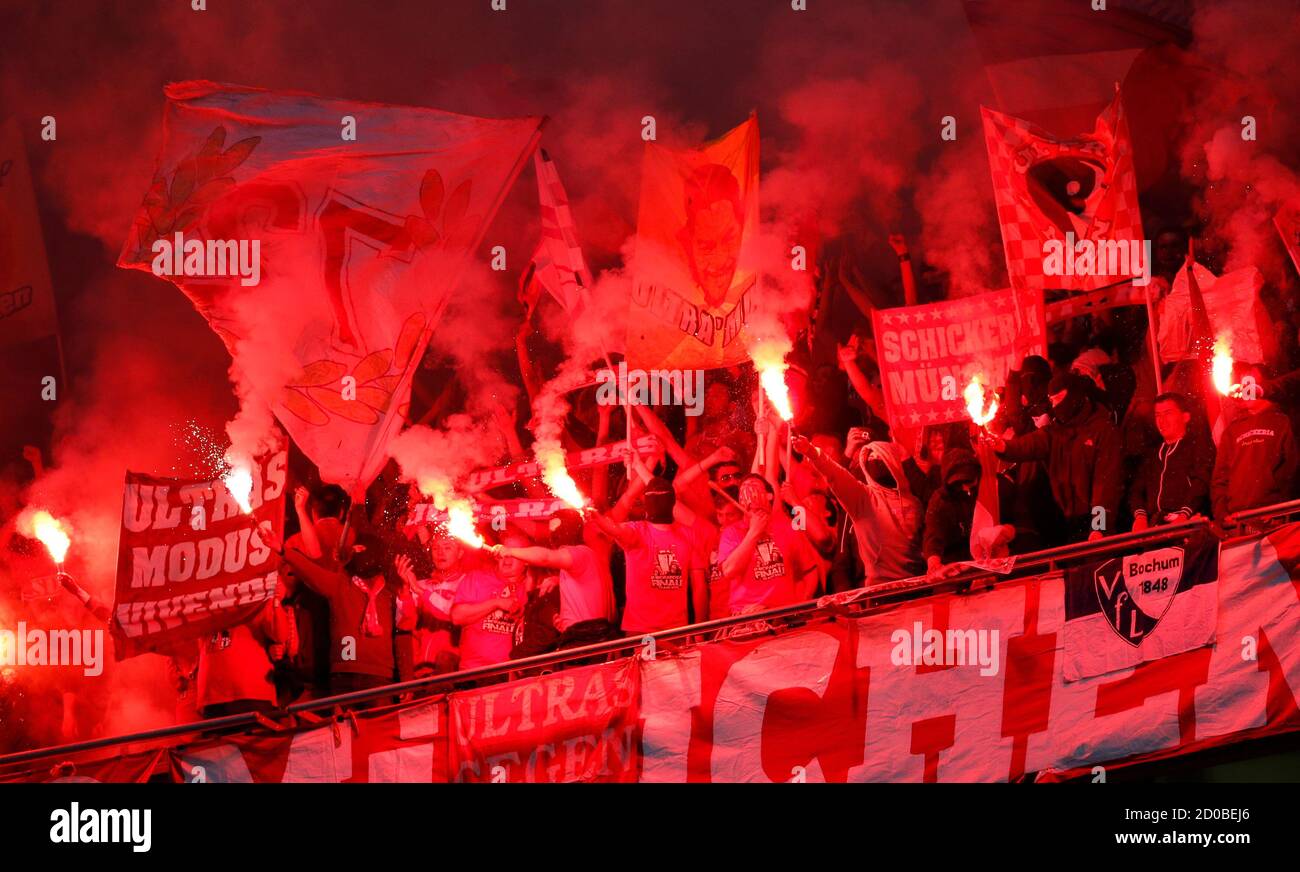 Borussia dortmund fans light flares hi-res stock photography and images ...