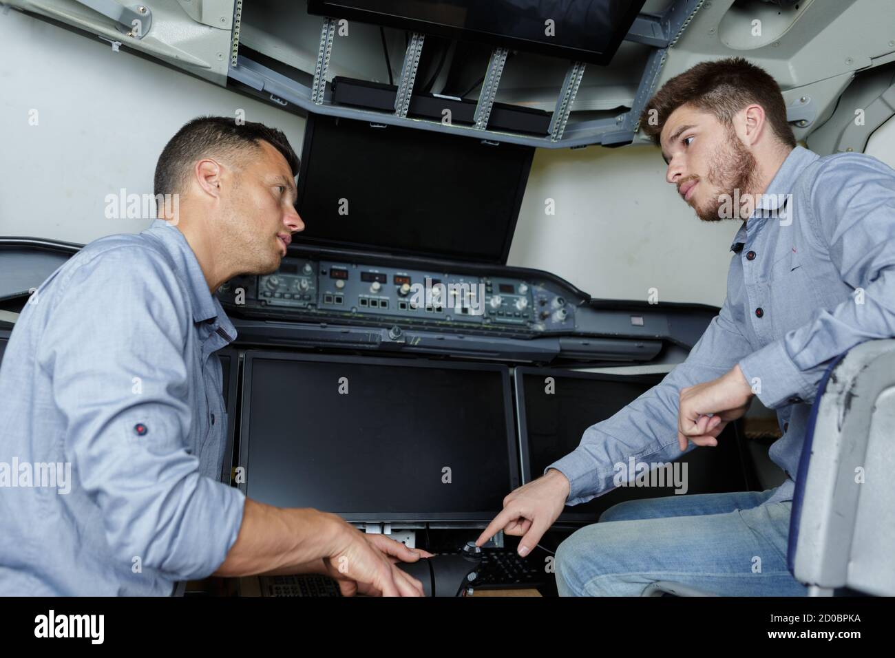 pilot student in airplane simulator Stock Photo - Alamy