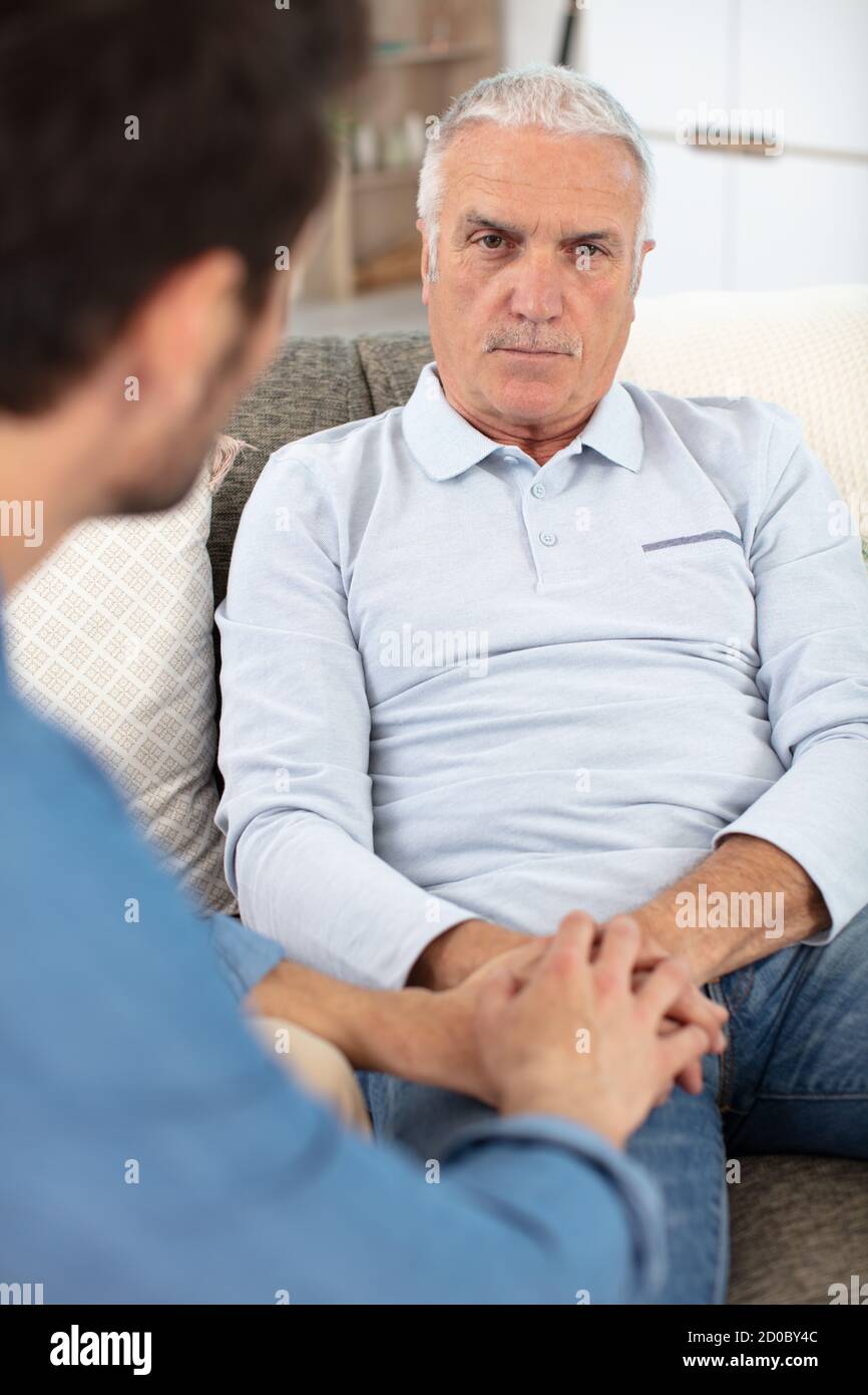 Dad holding stick hi-res stock photography and images - Alamy