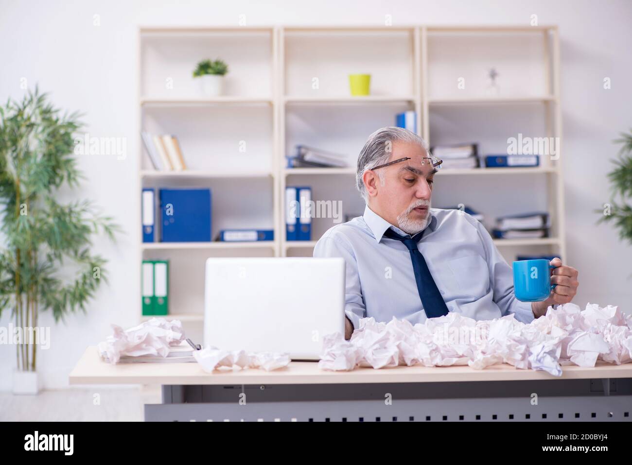 Old businessman rejecting ideas with lots of papers Stock Photo - Alamy