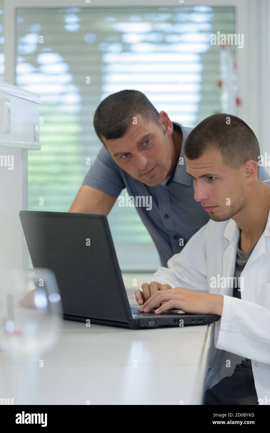 group of engineering students in the lab Stock Photo - Alamy